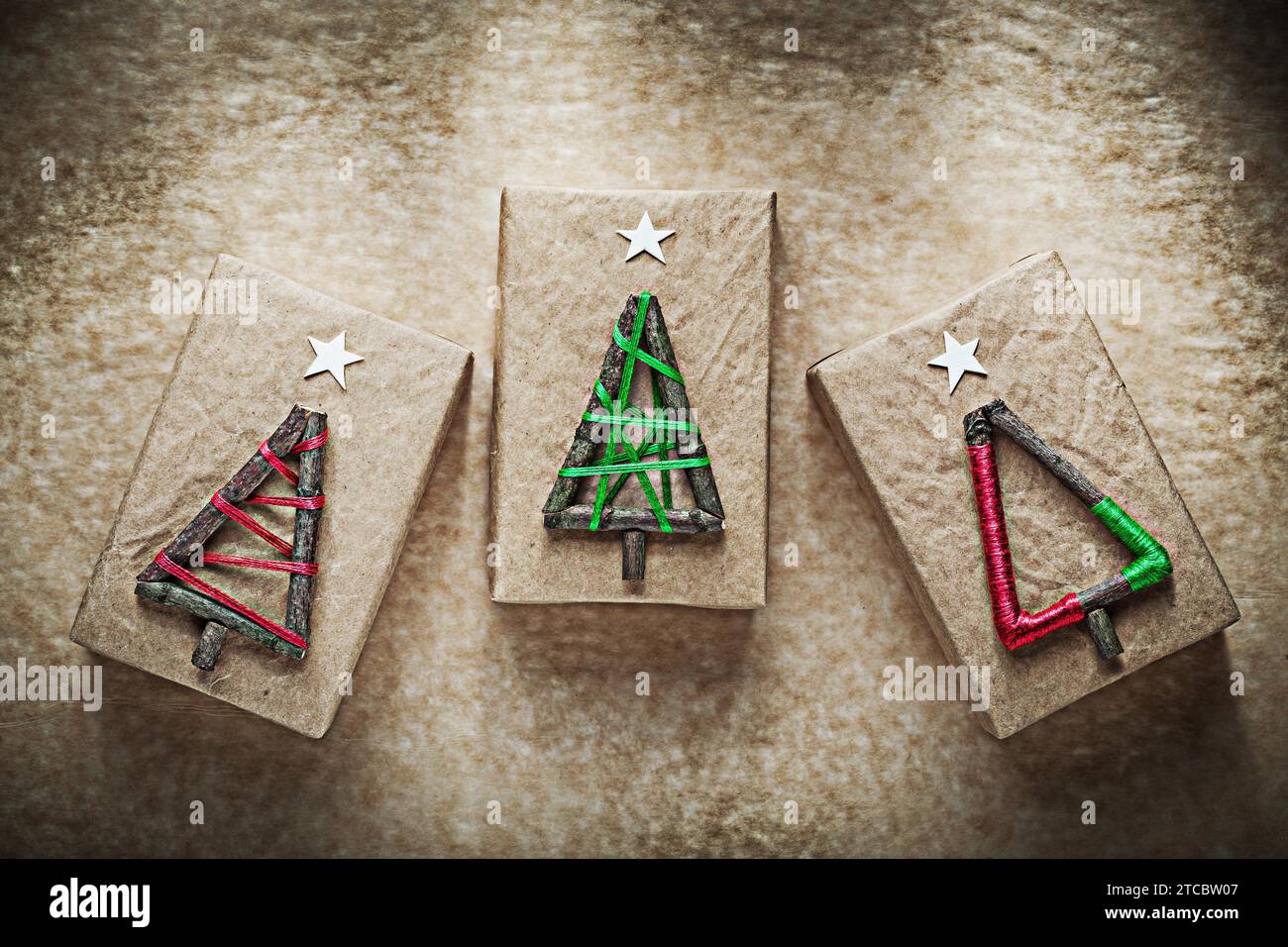 Christmas gift boxes on crumpled waste paper Stock Photo - Alamy