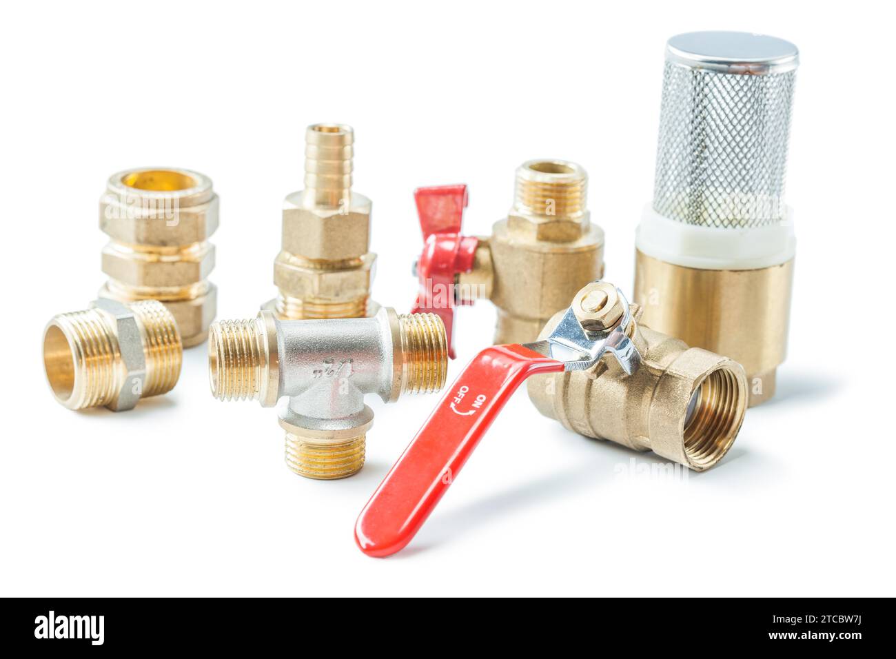 Brass pipe fittings and taps Grooving tools against a white background ...