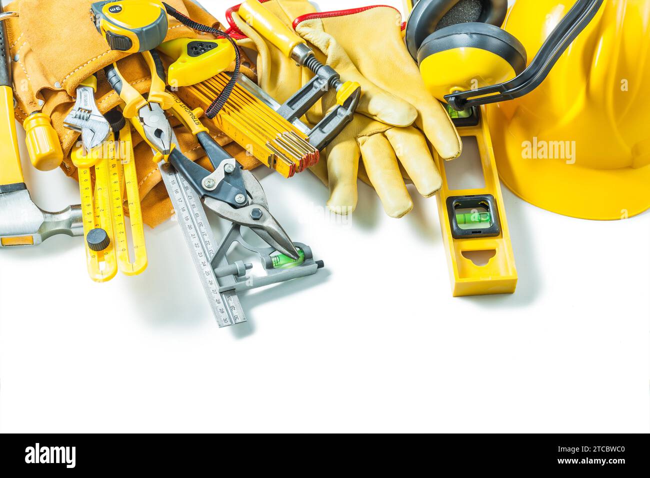 Close up view of large row of building tools against white background ...