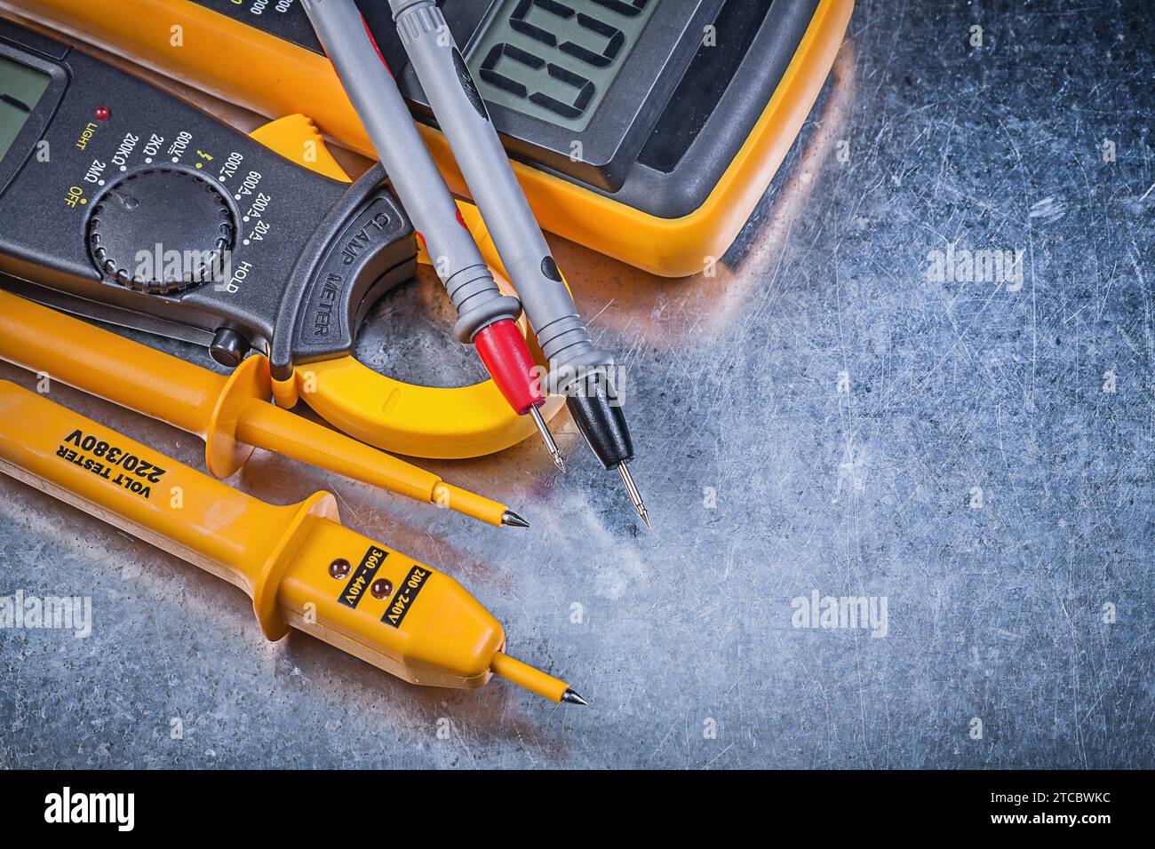 Digital ammeter electrical tester Multimeter on metallic background ...