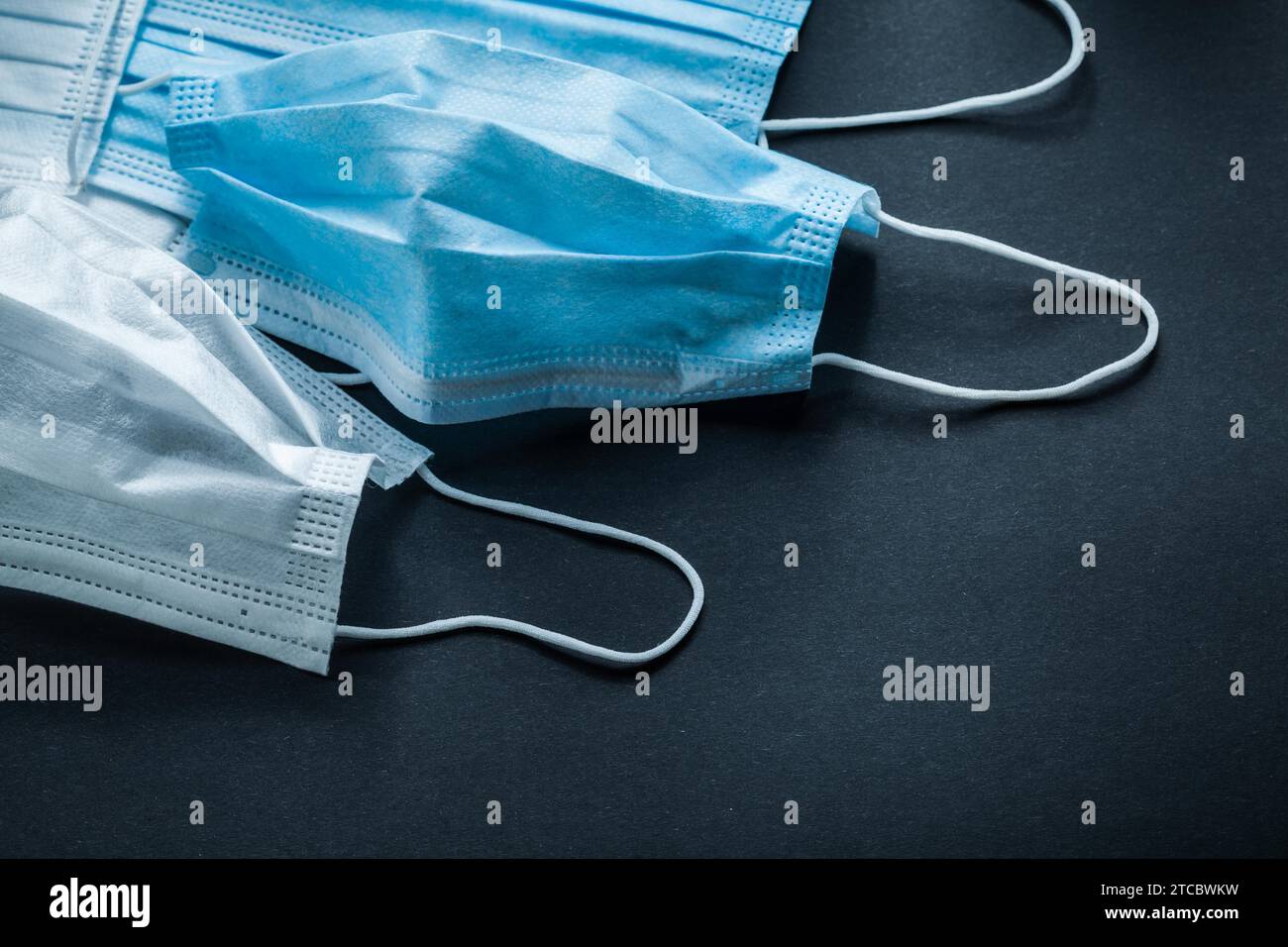 Sterile disposable masks on a black background Medical concept Stock ...