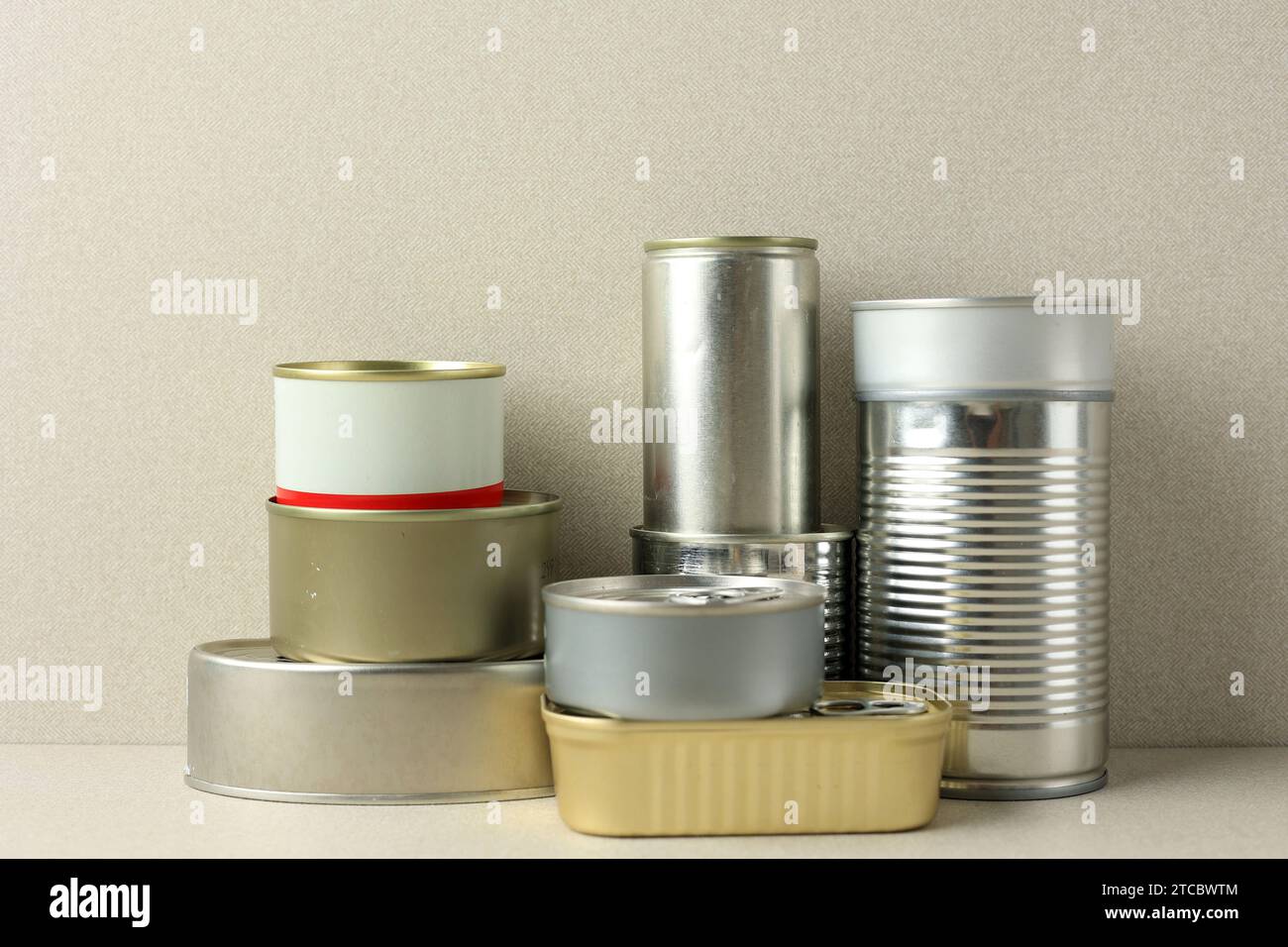 Different Size and Shape Stacked Tin Can with Food Stock Photo - Alamy