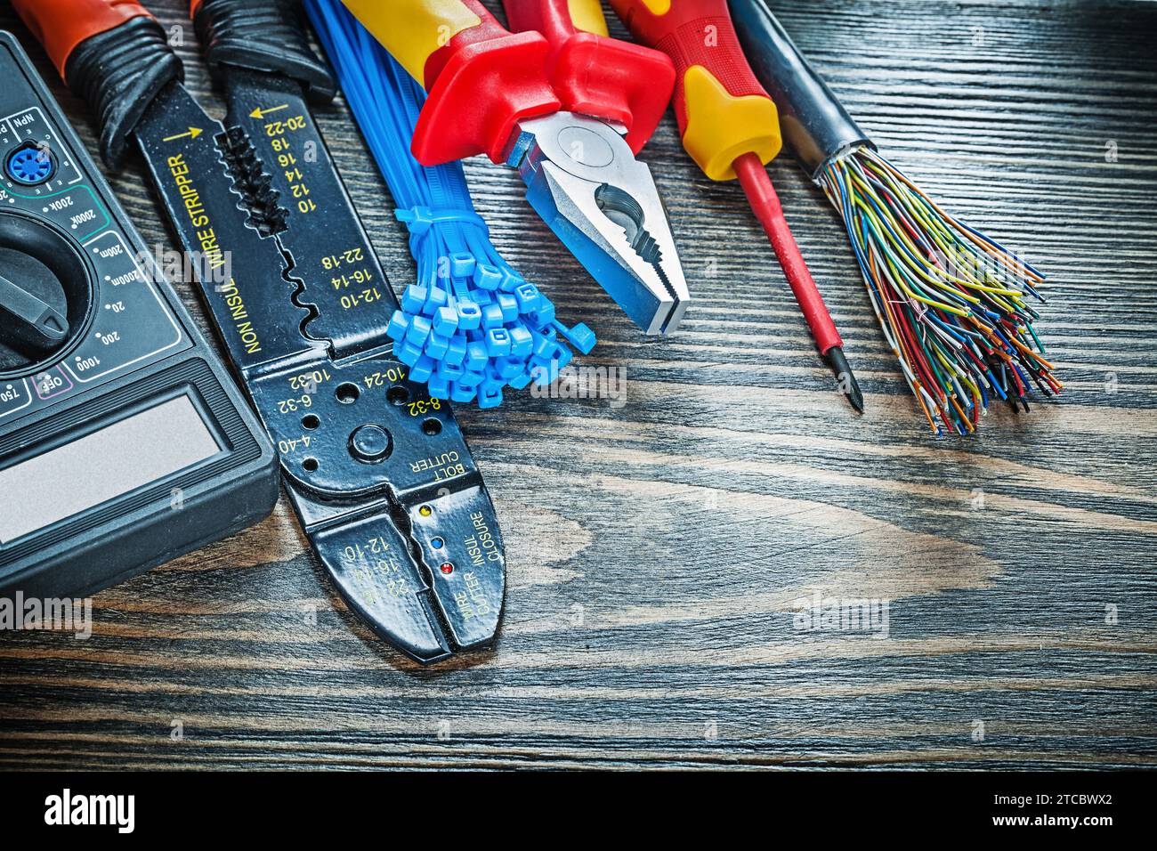 Electrical tester Screwdriver Wires Cable ties Bolt cutters Pliers ...