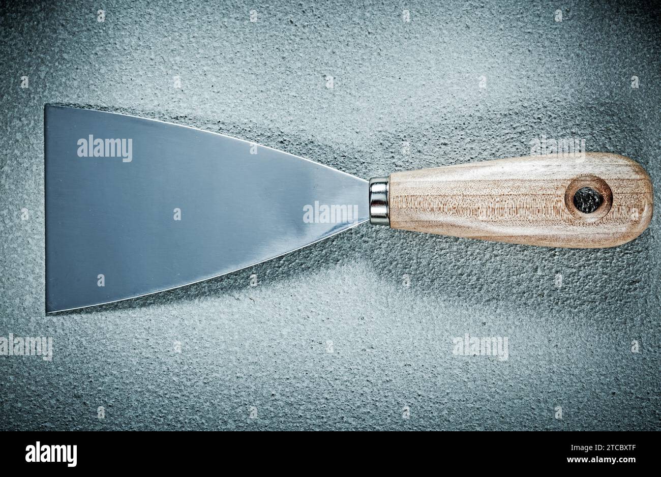 Pallet knife on concrete background construction concept Stock Photo ...