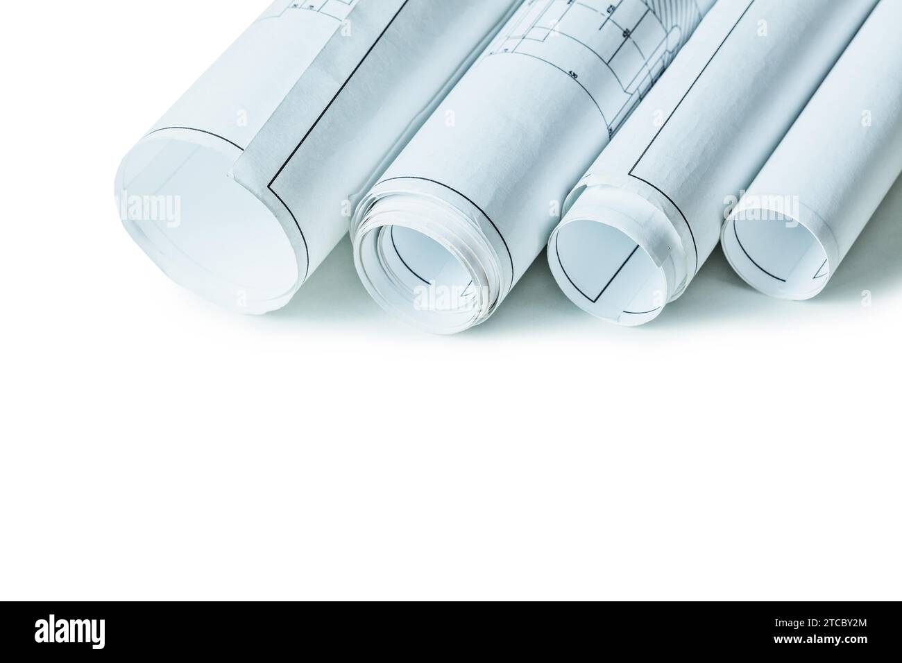 Four rolled blueprints against a white background Stock Photo - Alamy