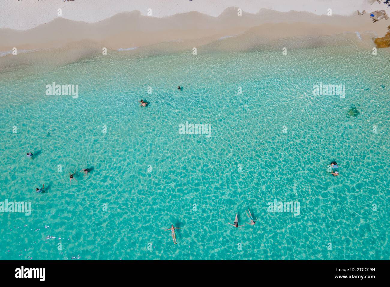 people swimming in the ocean during vacation at Koh Samet Island ...