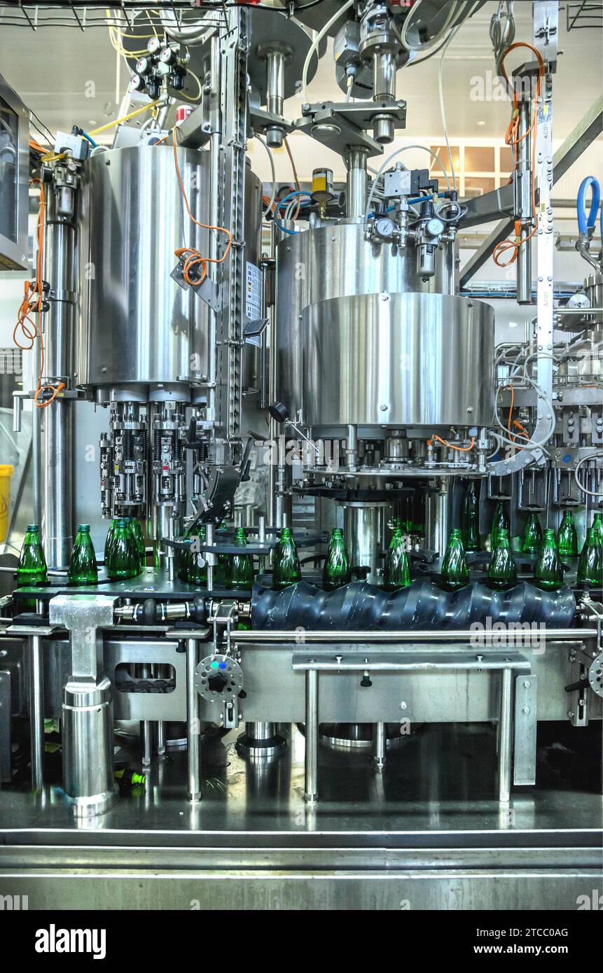 Water green bottling plant. Industrial conveyor of mineral water ...