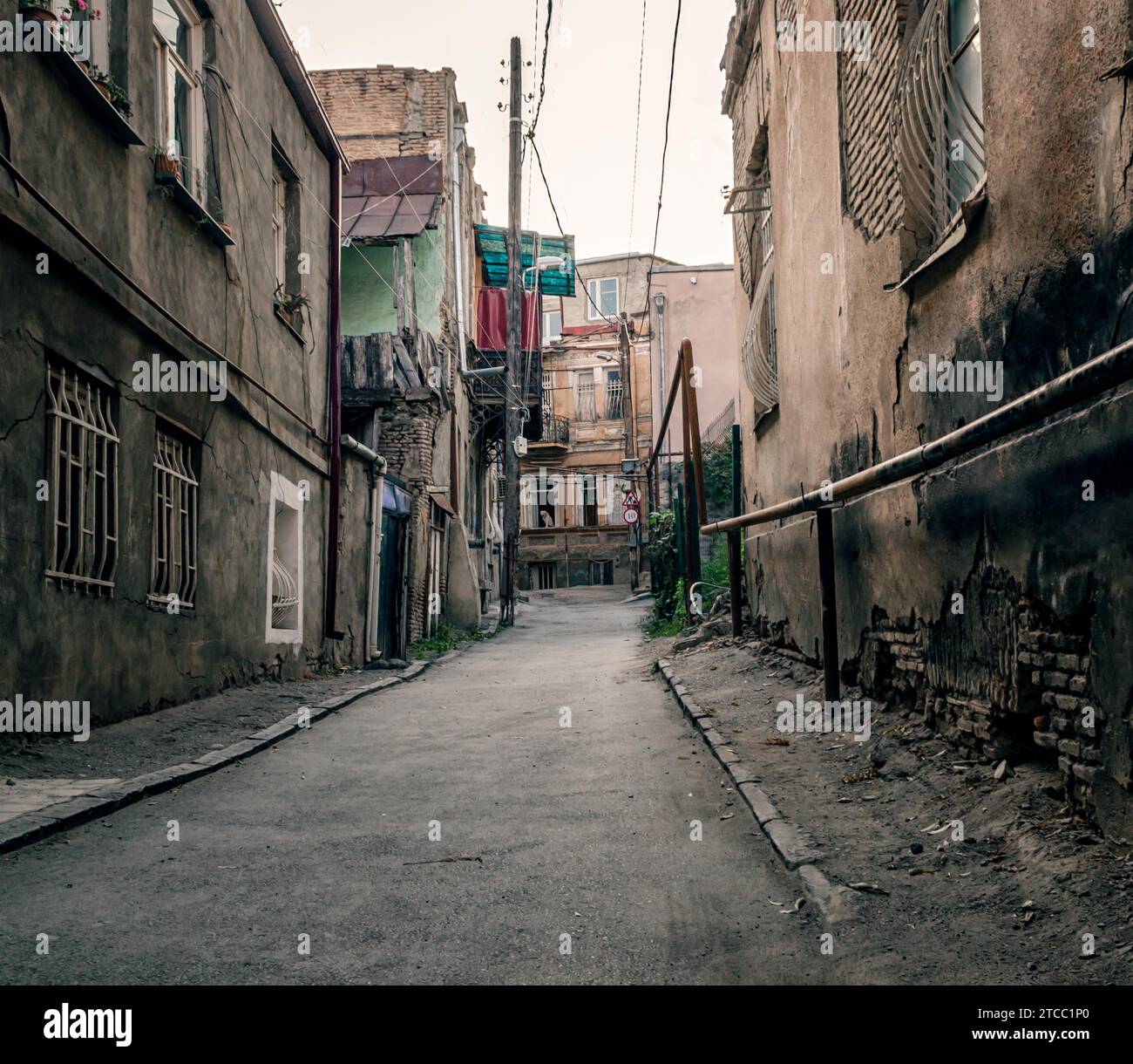 Slum old town street with ruined shacks in Georgia country Stock Photo ...
