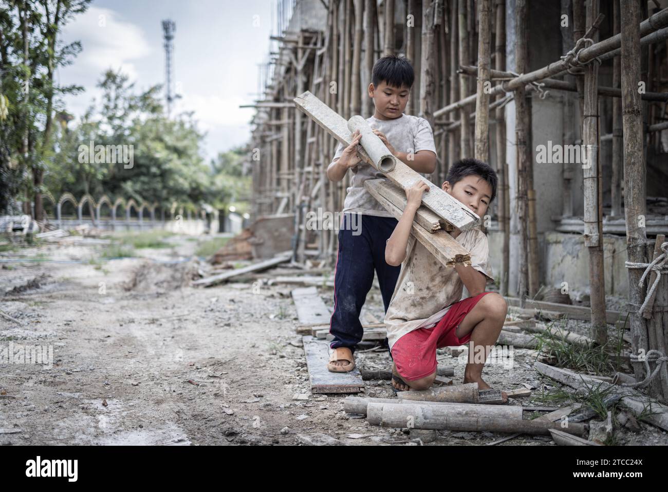 Concept of child labor, poor children being victims of construction ...