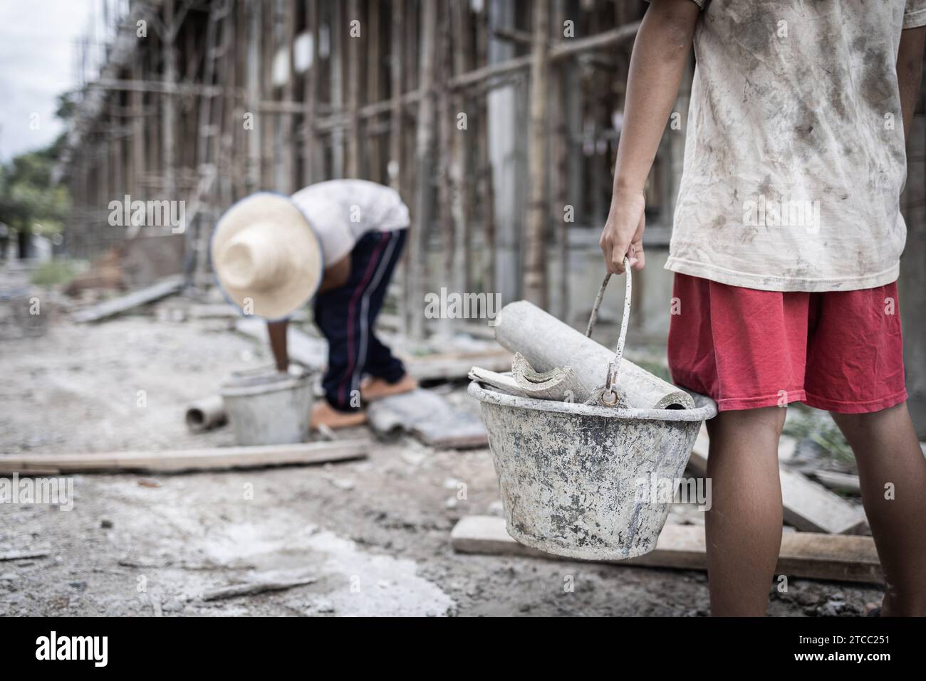 Concept of child labor, poor children being victims of construction ...