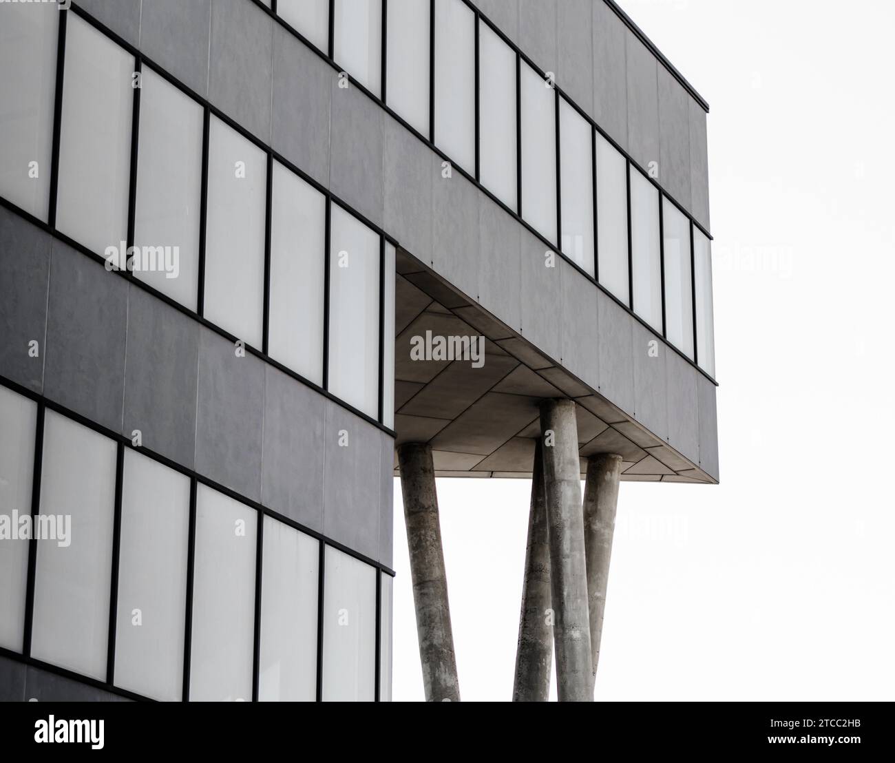 Concrete structure with columns and empty windows Stock Photo - Alamy