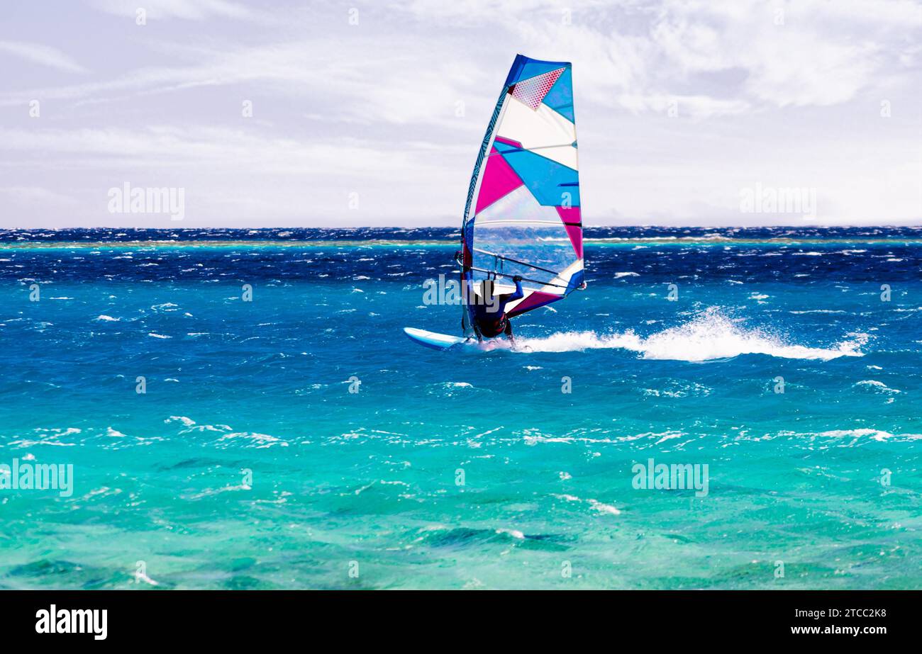 Windsurfer riding the waves hi-res stock photography and images - Alamy