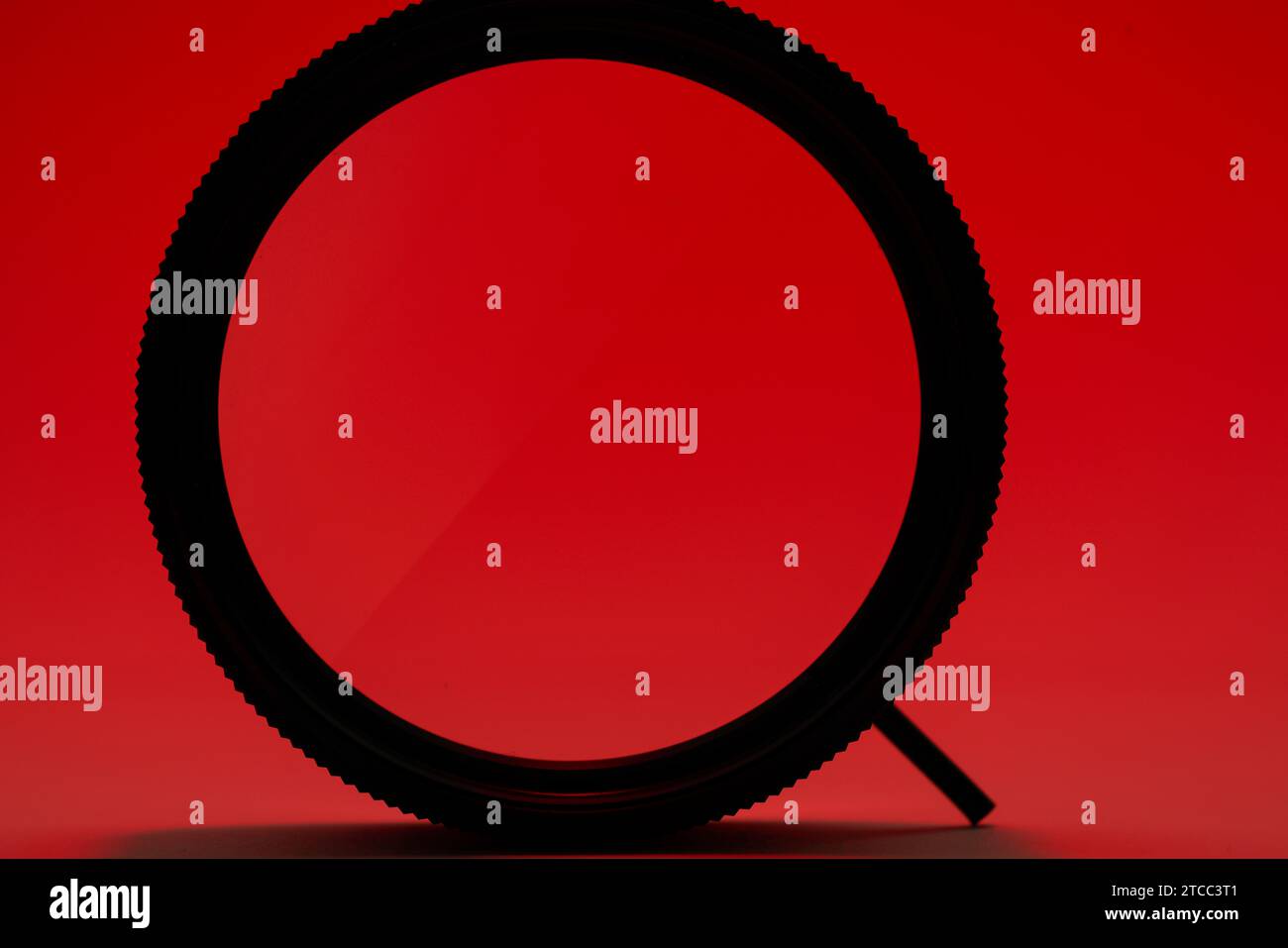 Red solid color background with light pattern as photo Stock Photo - Alamy