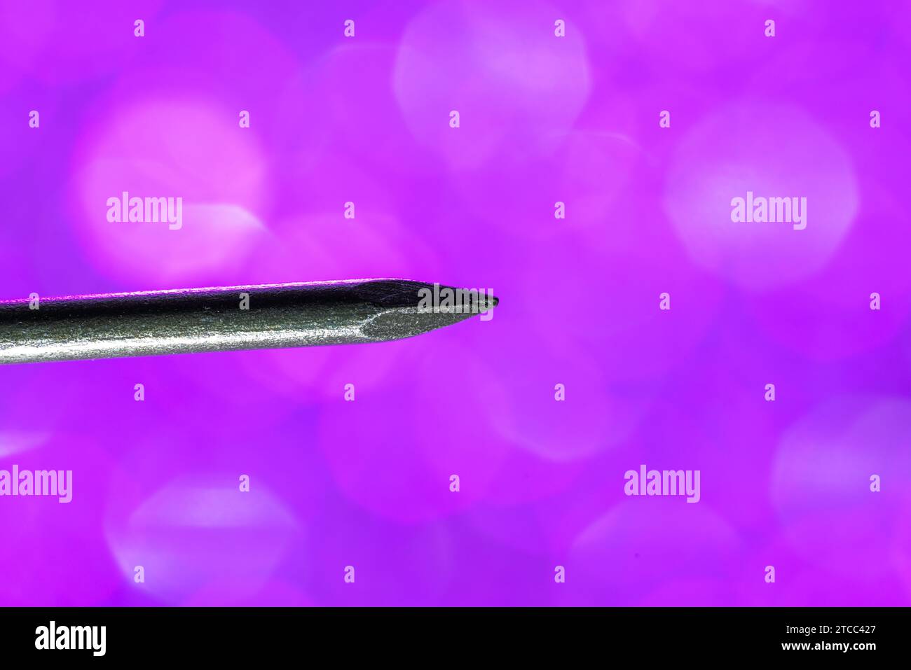 Nail for blurred background photographed with lens flare in the studio ...