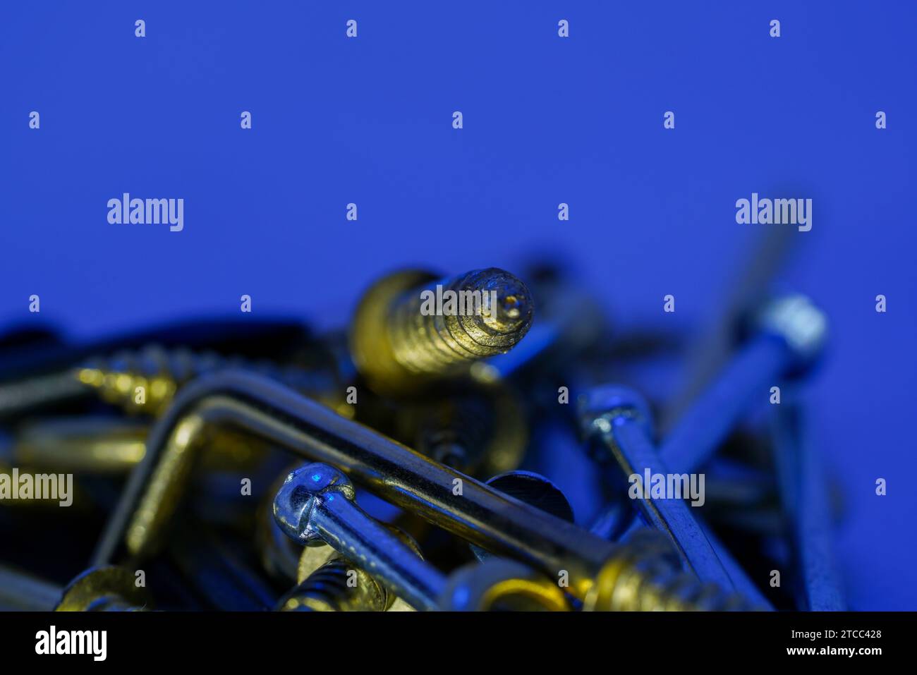 A colorful mix of nails and screws with eyelets and hoes Stock Photo ...