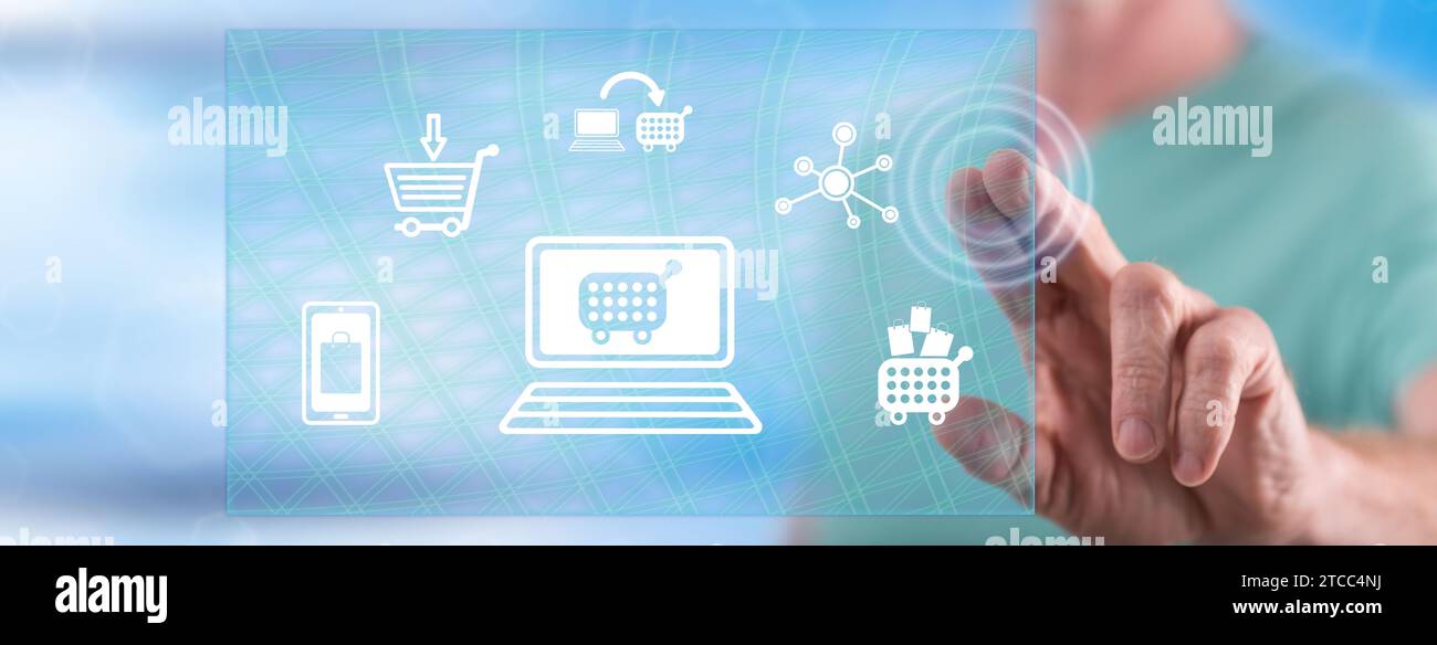 Man touching an online shopping concept on a touch screen with his ...
