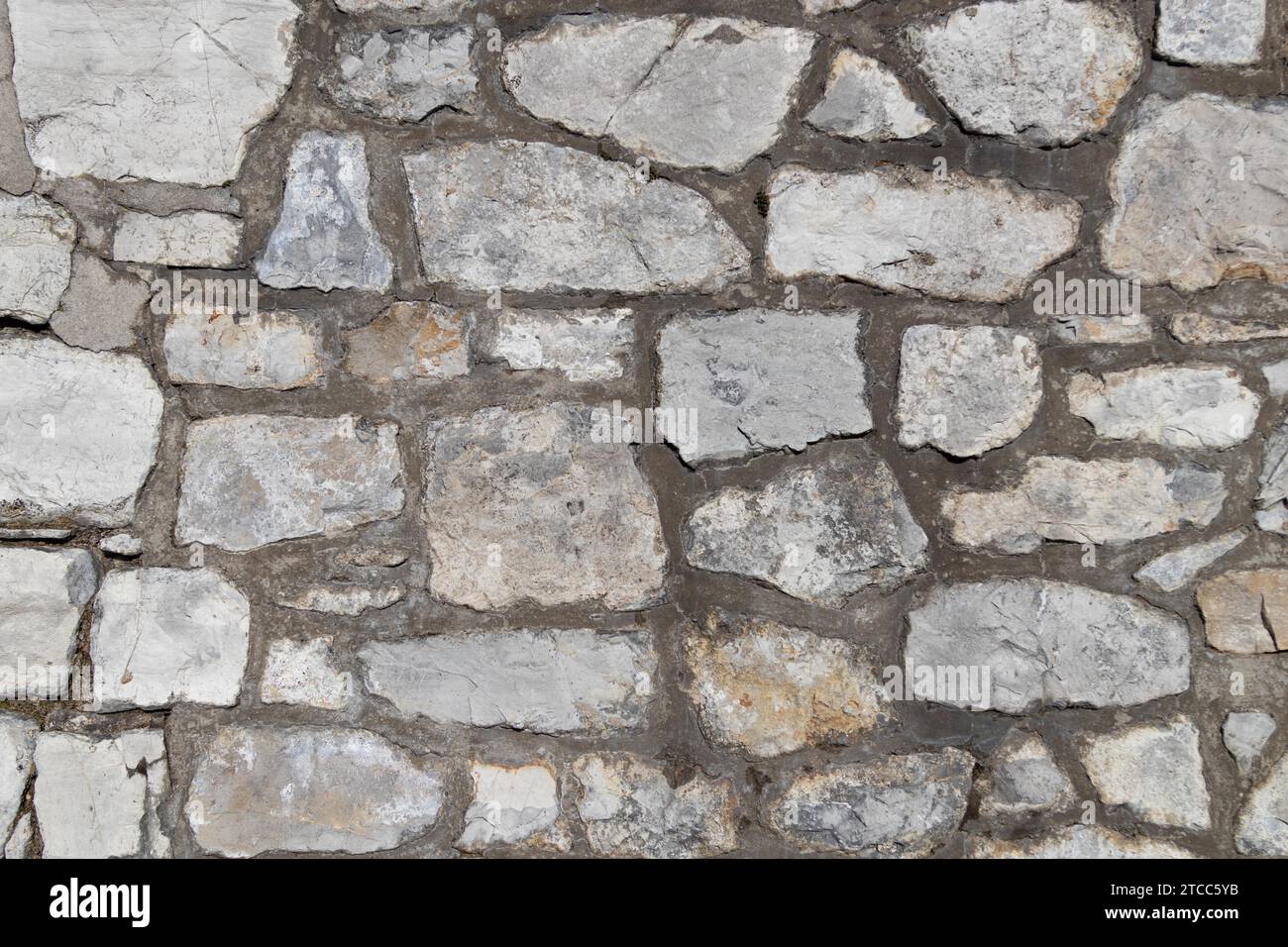 Grey stone wall from an historic castle in Germany as texture and ...