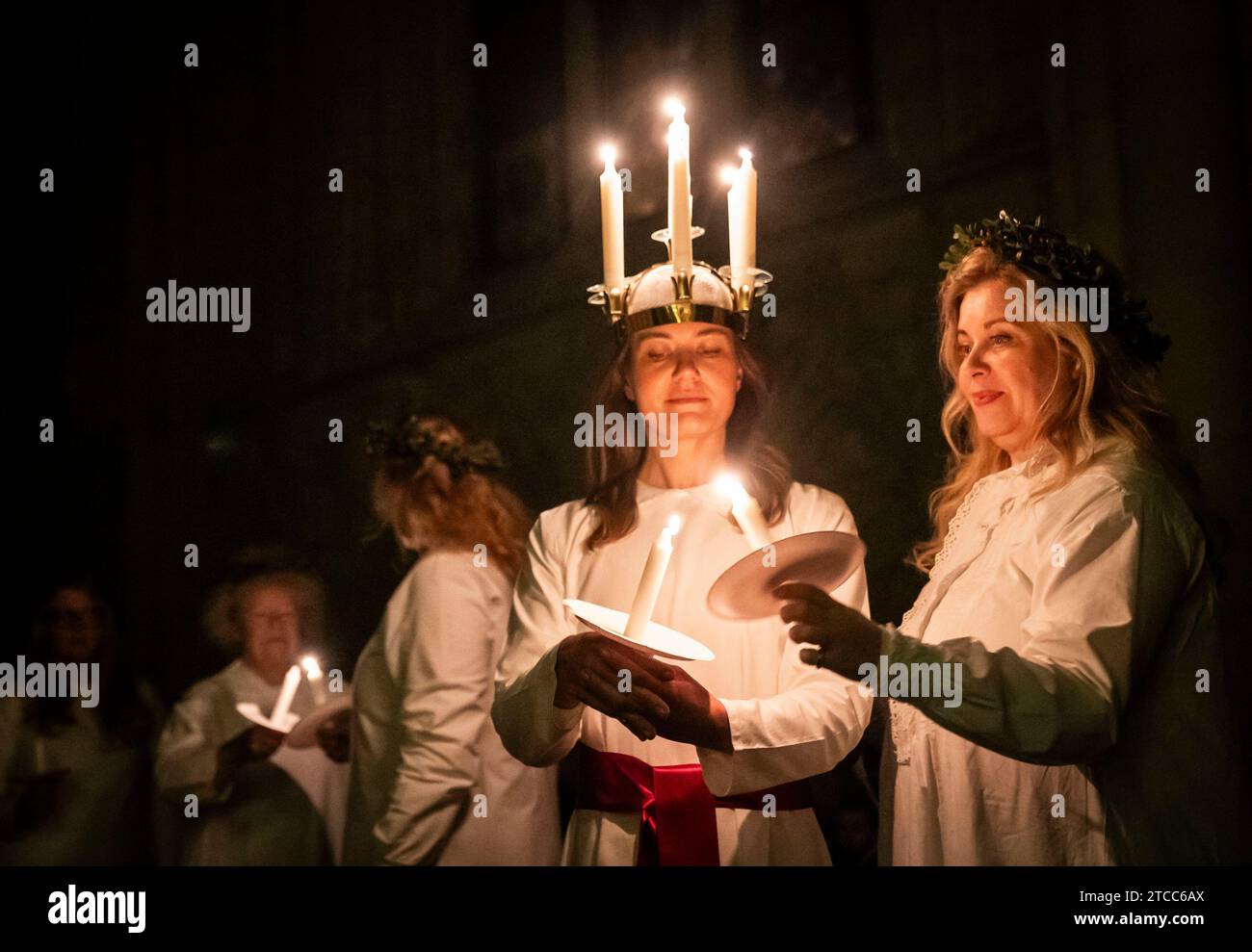 Linnea Isén wears a crown of candles symbolising St Lucy as she leads the celebration of Sankta ...