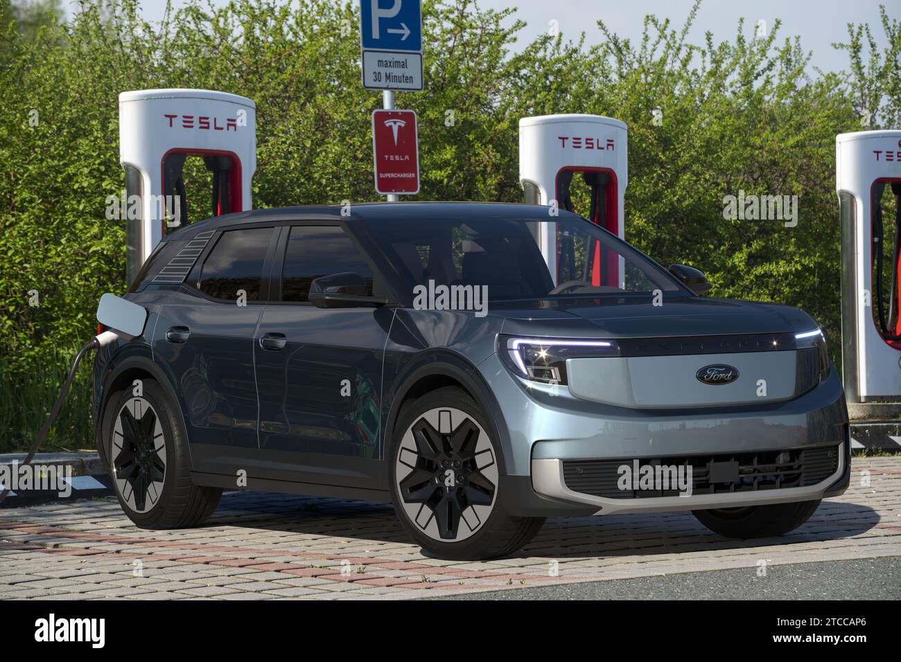 New All-Electric Ford Explorer at Tesla charging station Stock Photo ...