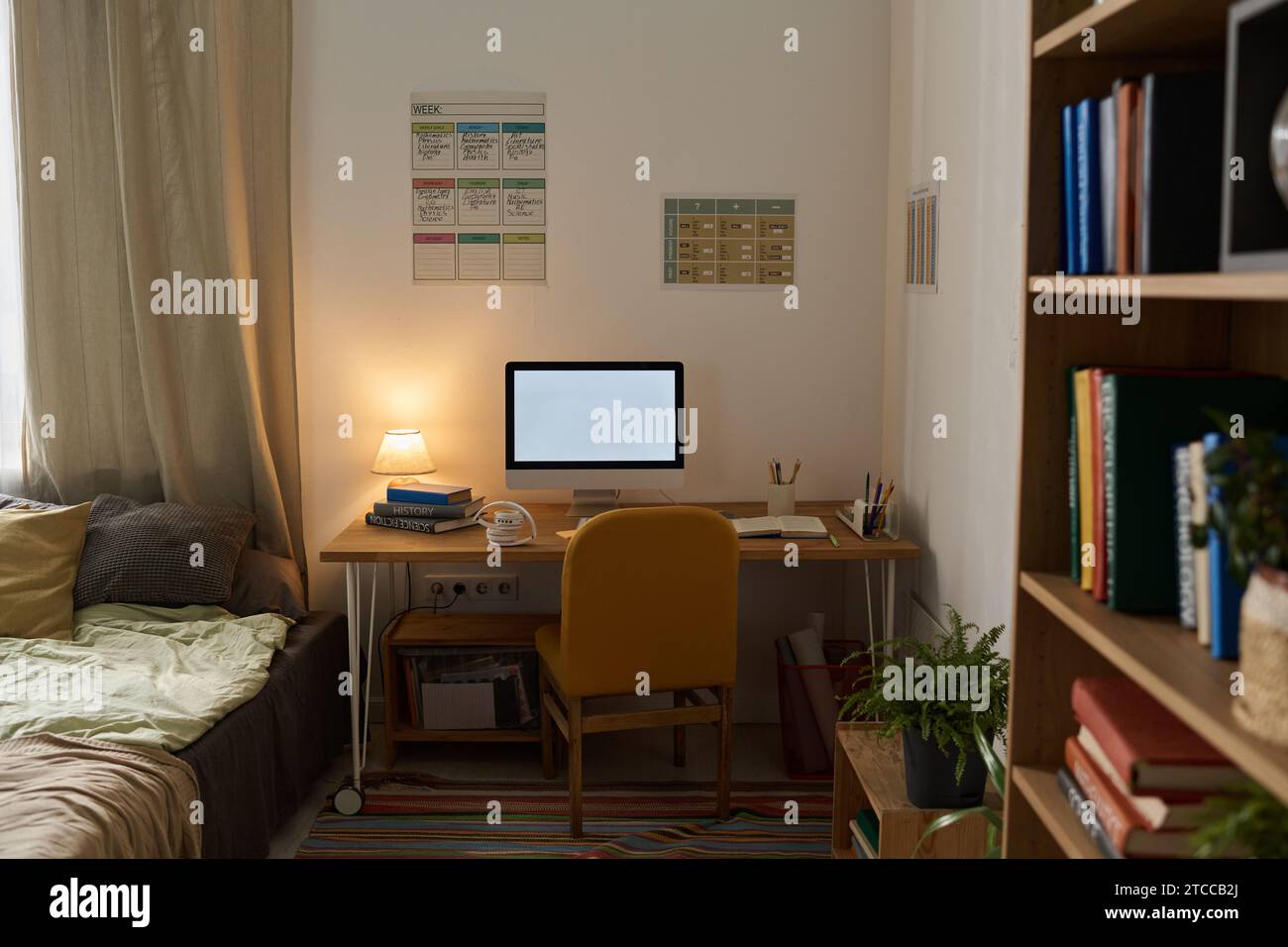 Modern workplace with computer monitor in teenage room Stock Photo - Alamy
