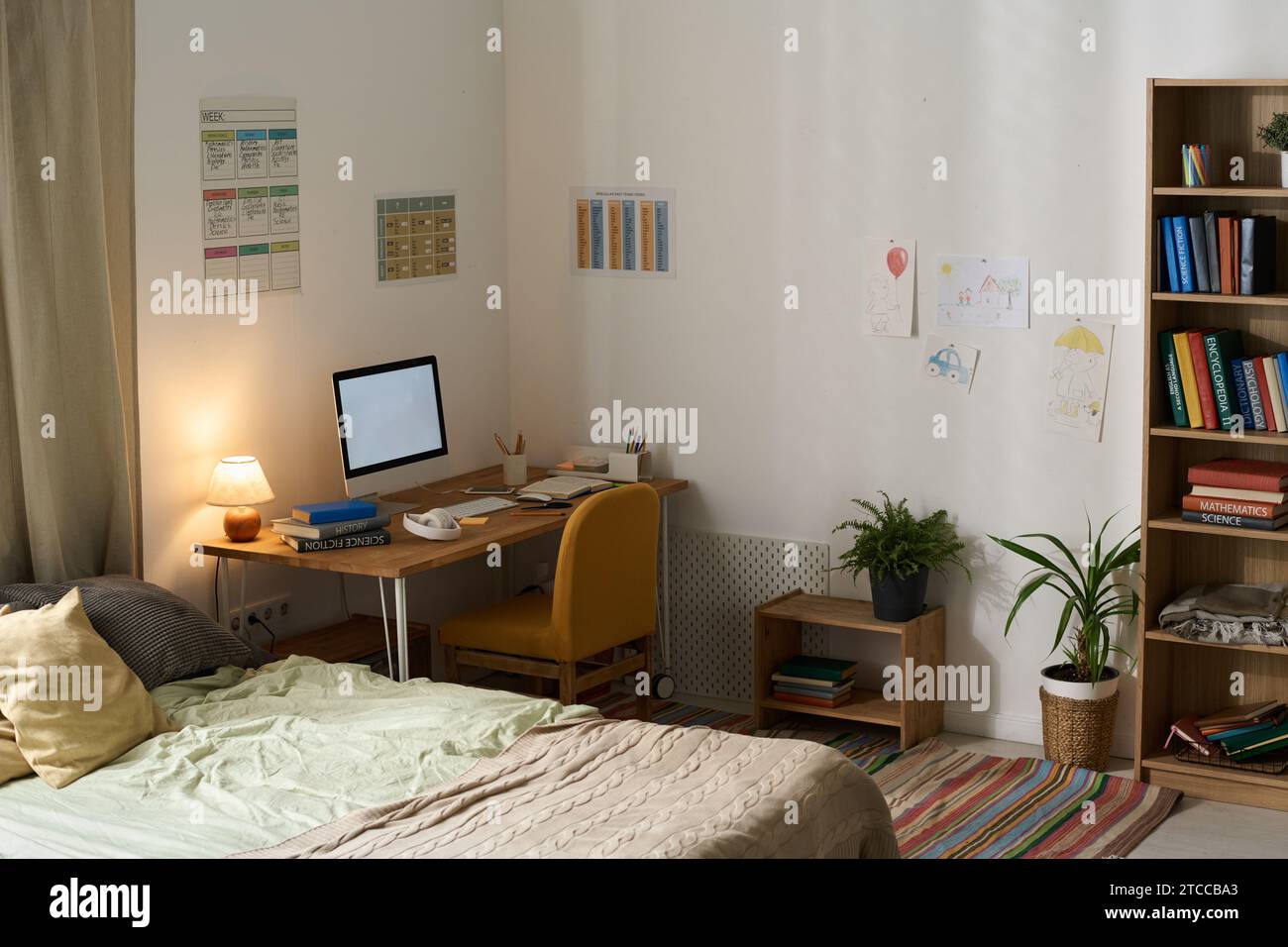 Modern room of teenager with workplace and computer monitor on it Stock ...