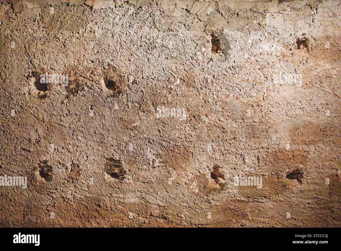 abstract background of concrete surface with shell hole. War in Ukraine ...