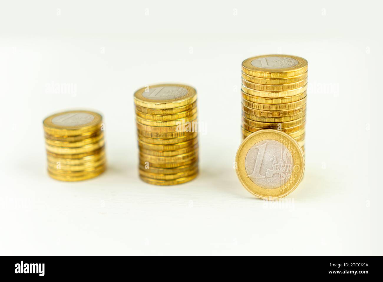 stack of gold coins with trading chart in financial concepts and ...