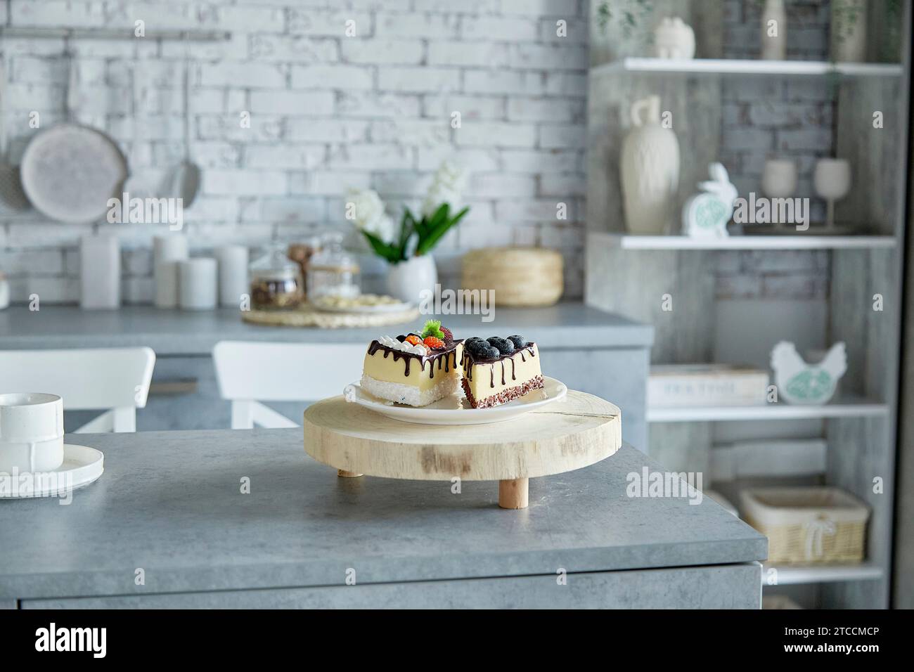 Plastic artificial cakes pieces in the studio cuisine. Food shooting ...