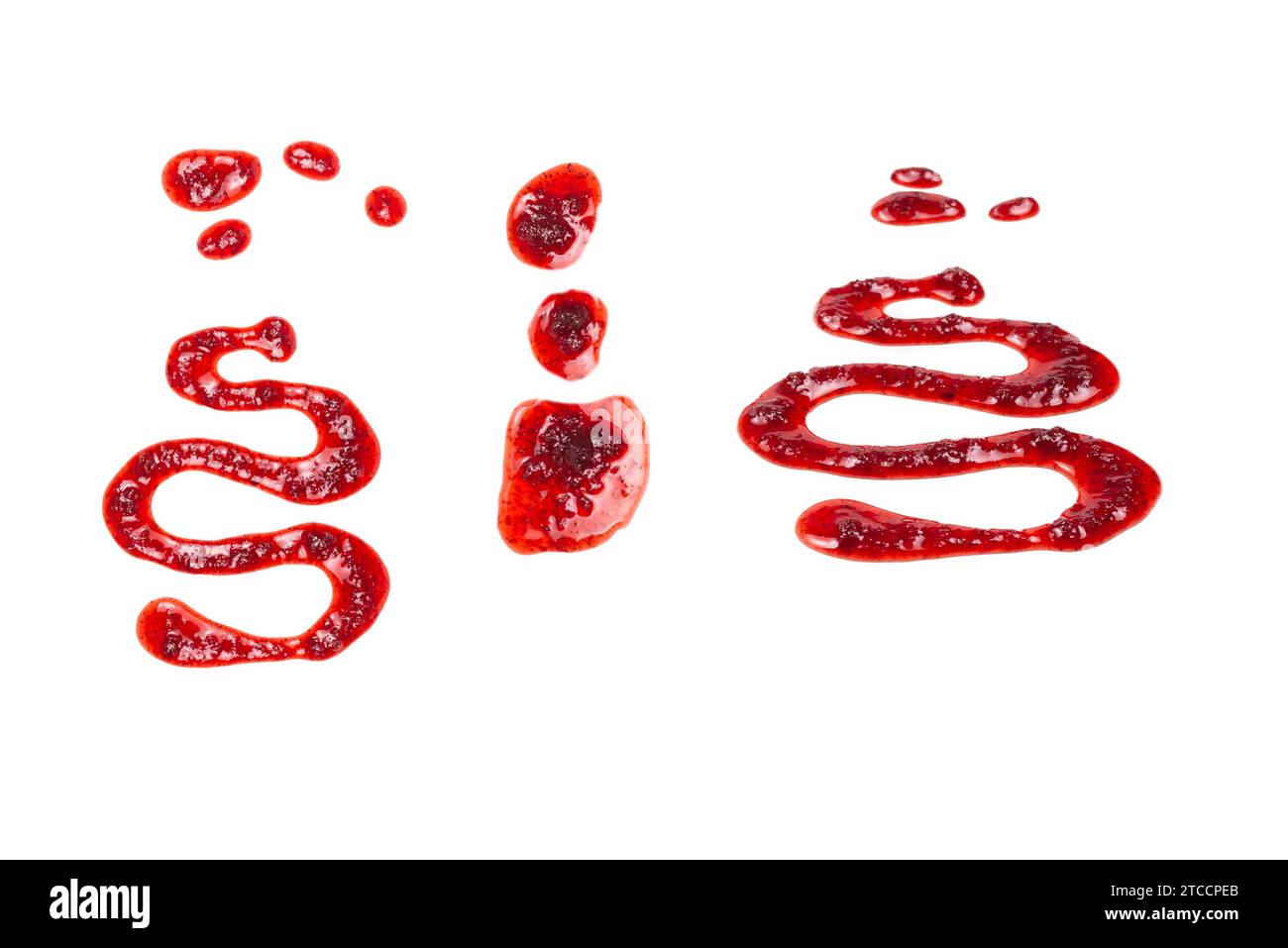 Red jam splashes isolated on white Stock Photo - Alamy