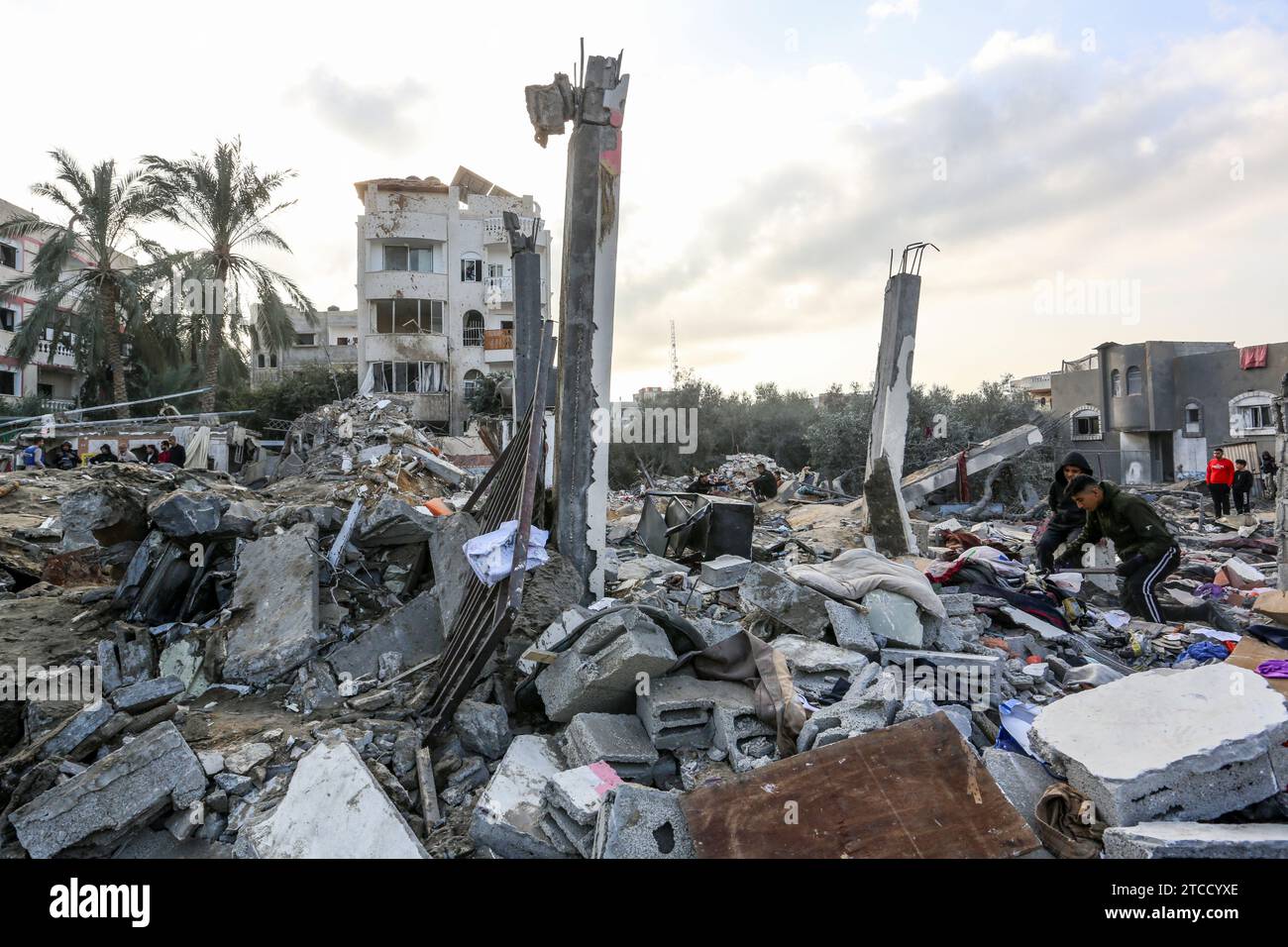 Rafah, Palestinian Territories. 12th Dec, 2023. Palestinians inspect ...