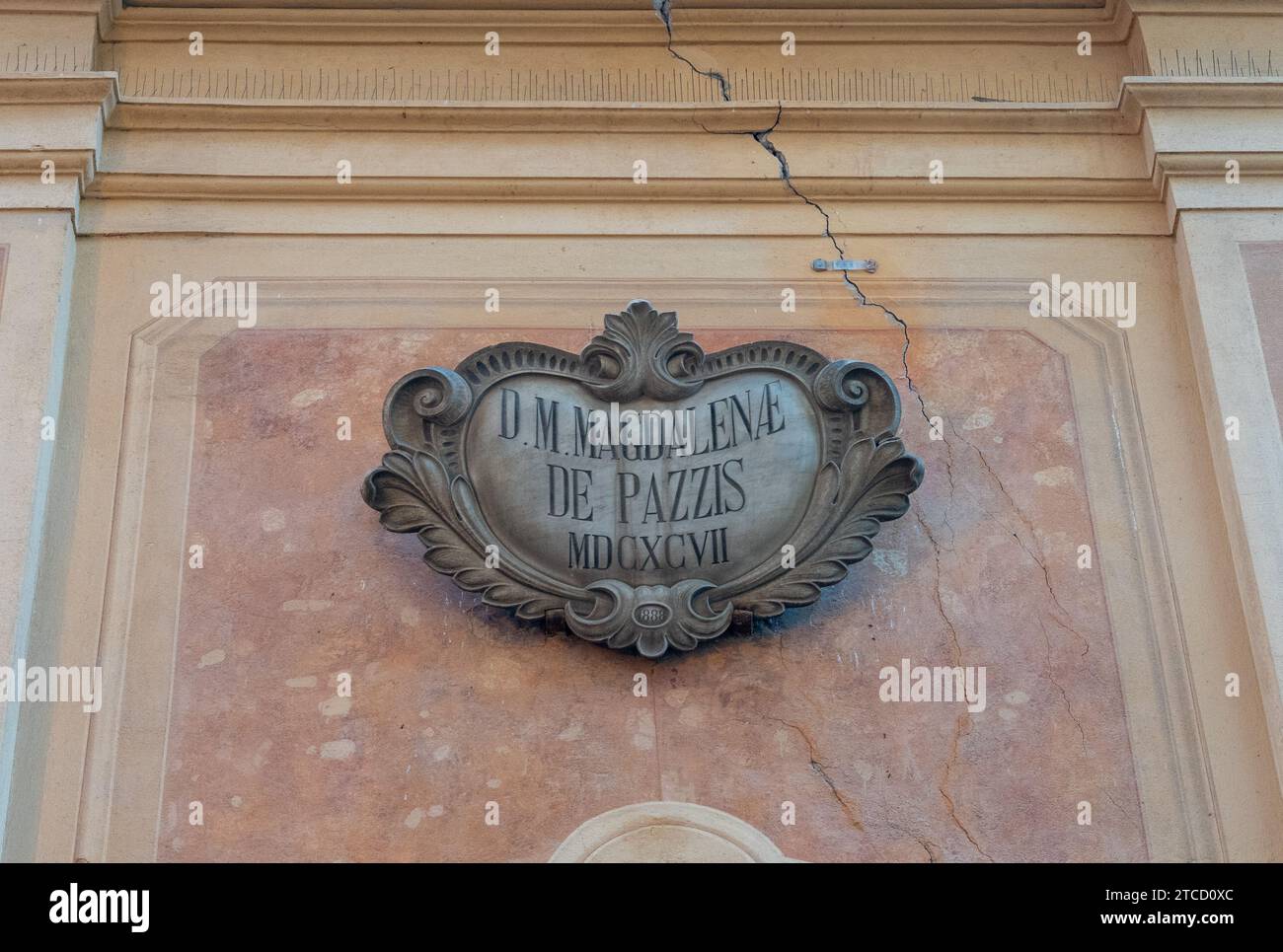 Stone plaque with inscription on the facade of the church of Santa ...