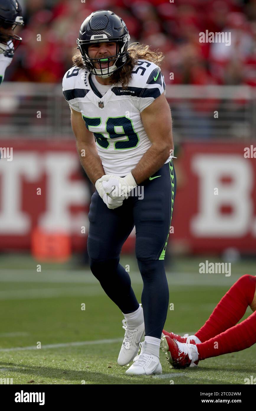 Seattle Seahawks linebacker Jon Rhattigan (59) reacts after tackling ...