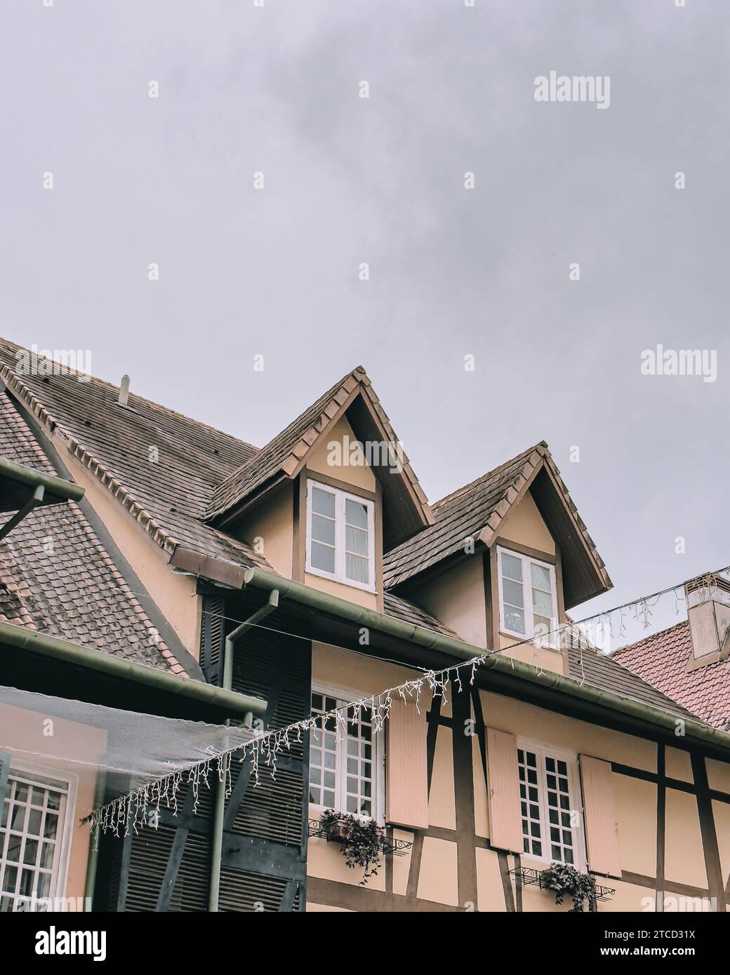 An exterior view of a traditional, older-style building with two ...