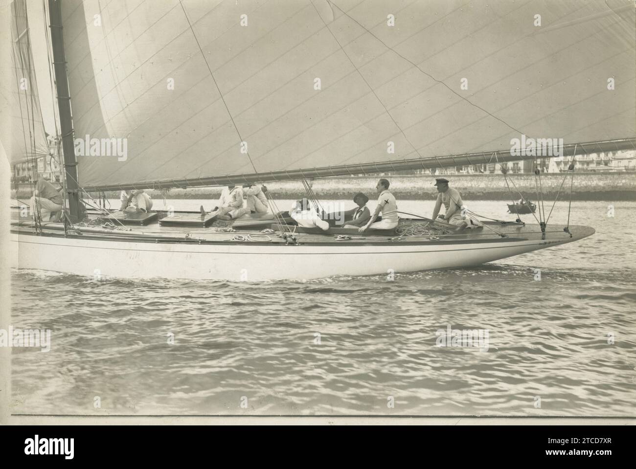 Santander, 08/02/1914. King Alfonso XIII raising the rudder of his ...