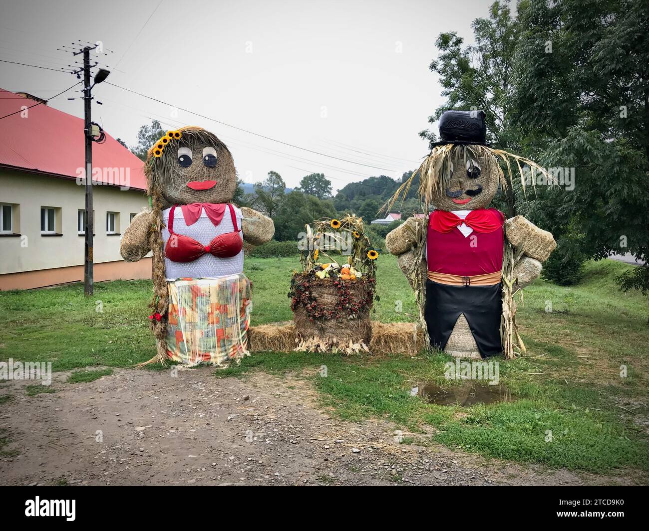 Effigies made of straw for a harvest festival in a village in ...