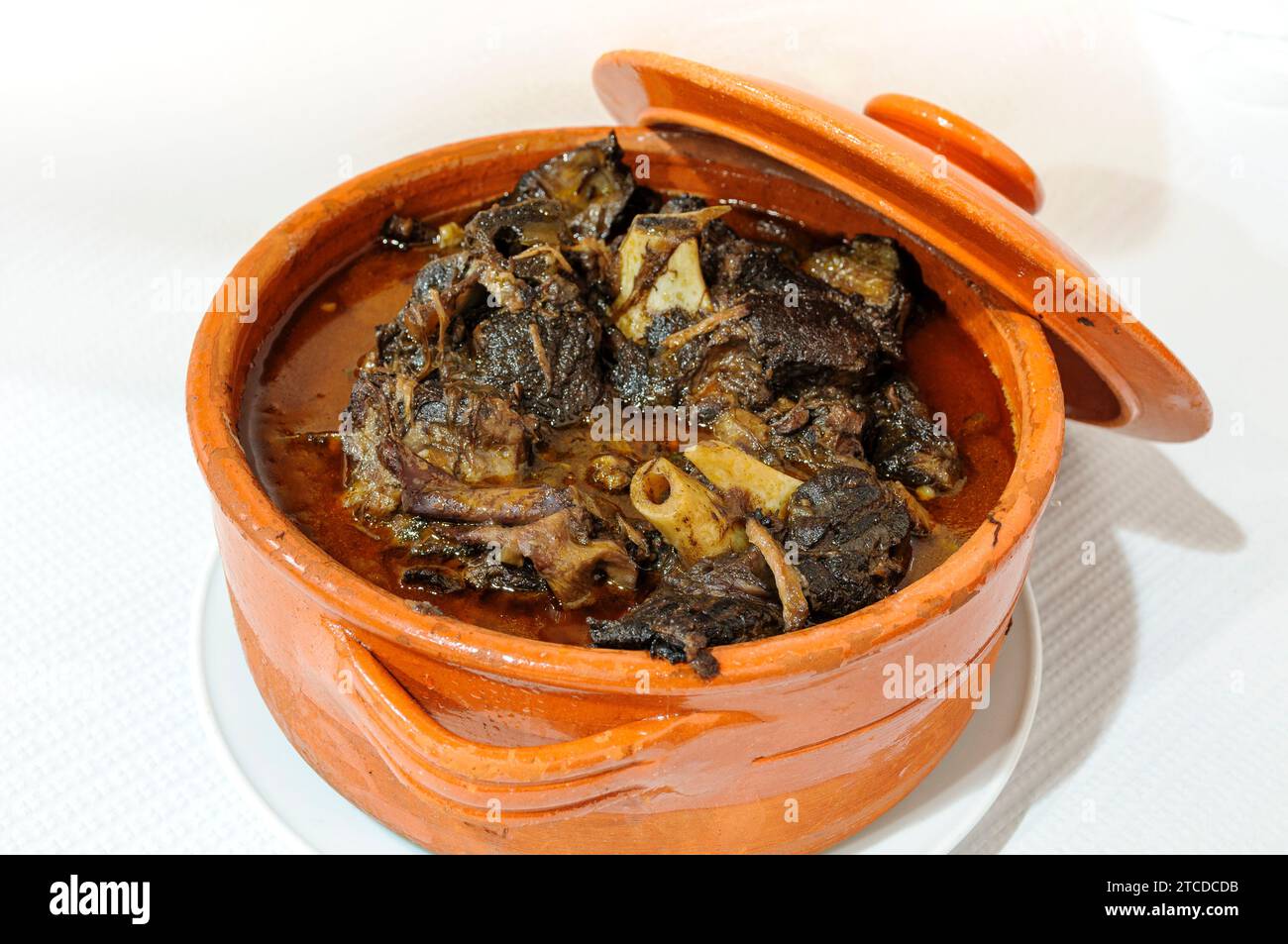 Clay pot of the traditional Chanfana, goat meat, cooked in the wooden ...