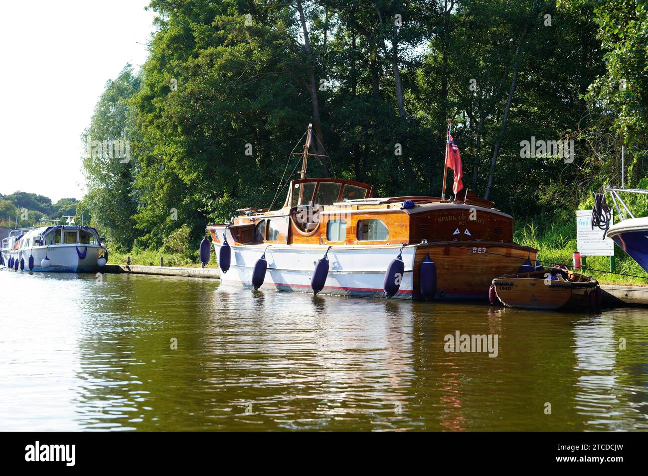 Traditional Broads cruiser Spark of Light, moored at Barton Turf ...