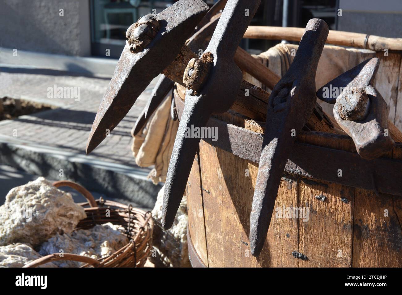 Blocks of gypsum minerals and old rusty tools for its extraction Stock ...