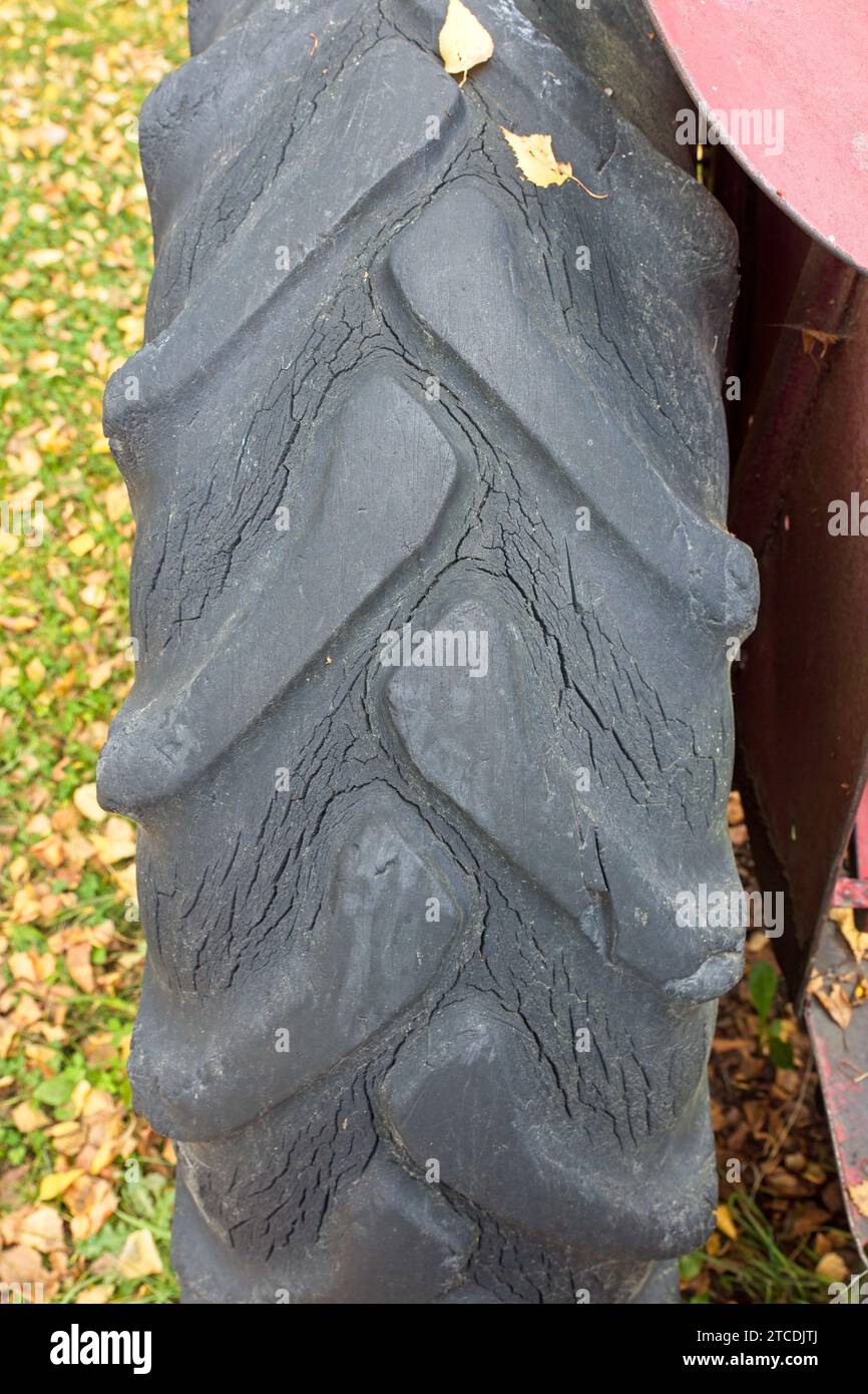 Closeup details of old cracking tractor tire treads Stock Photo - Alamy