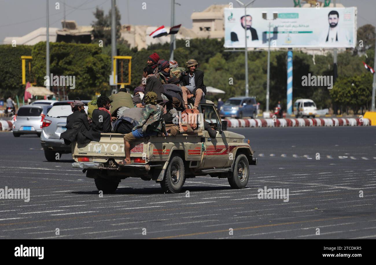 SANAA, Sanaa, Yemen. 12th Dec, 2023. Houthi fighters ride a truck in ...