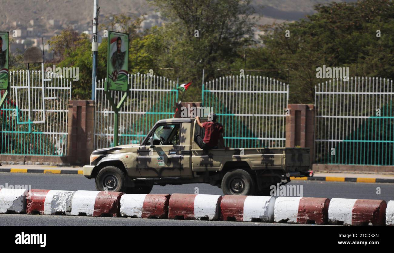 SANAA, Sanaa, Yemen. 12th Dec, 2023. Houthi fighters ride a truck in ...