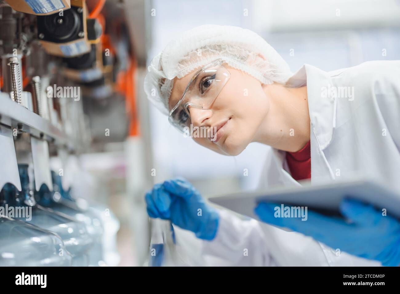 caucasian women worker working in water plant factory clean hygiene ...