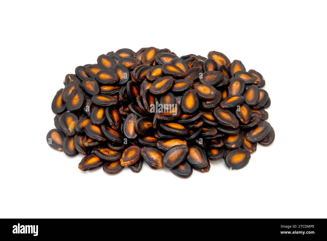 Roasted Watermelon seeds on a white background Stock Photo - Alamy