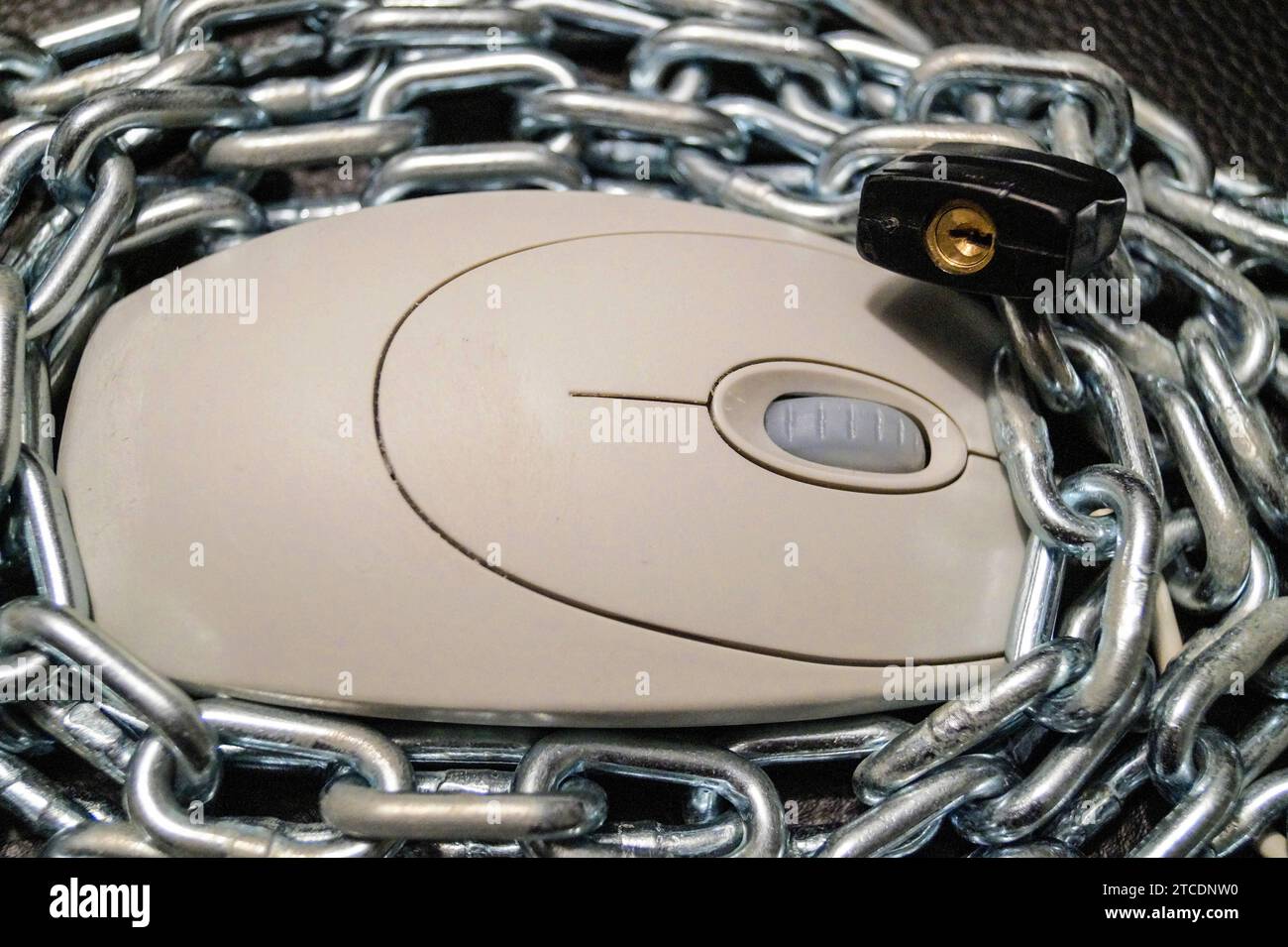 PC mouse with chain and security lock, symbol picture for data privacy ...