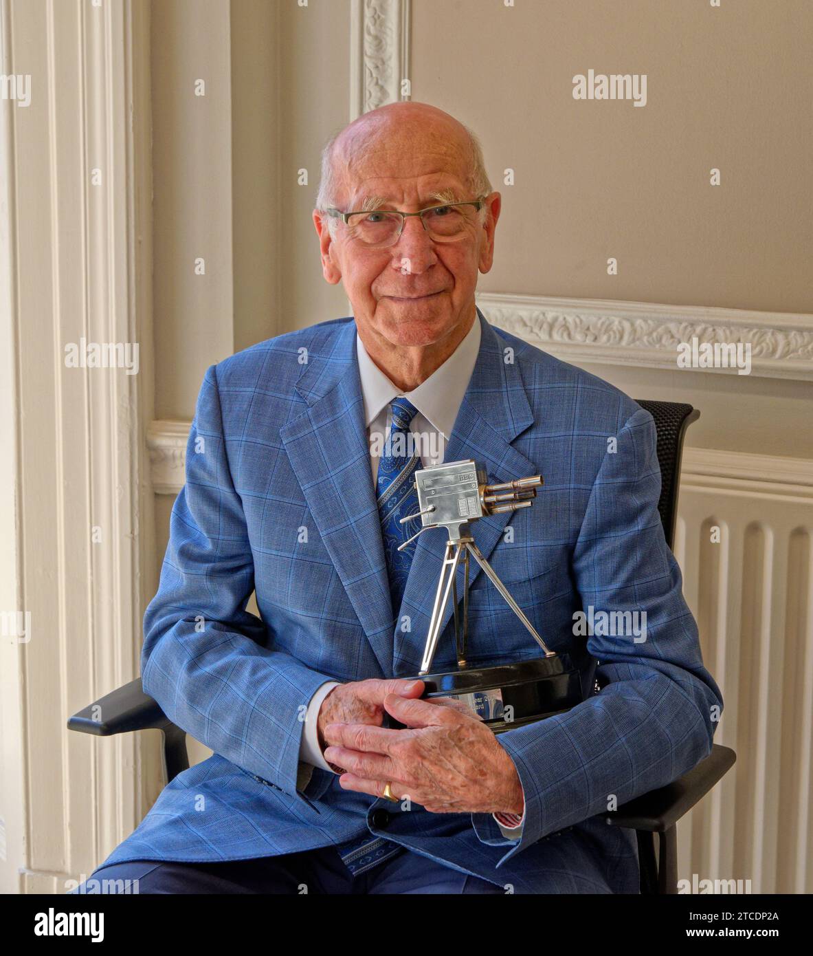 Sir Bobby Charlton, former footballer, holding the BBC Sports ...