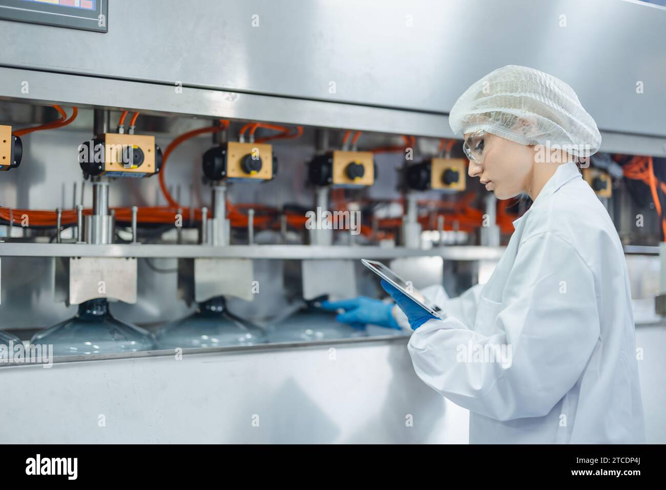 caucasian women worker working in water plant factory clean hygiene ...