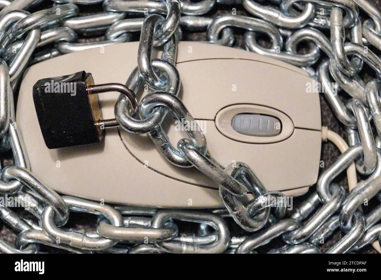 PC mouse with chain and security lock, symbol picture for data privacy ...
