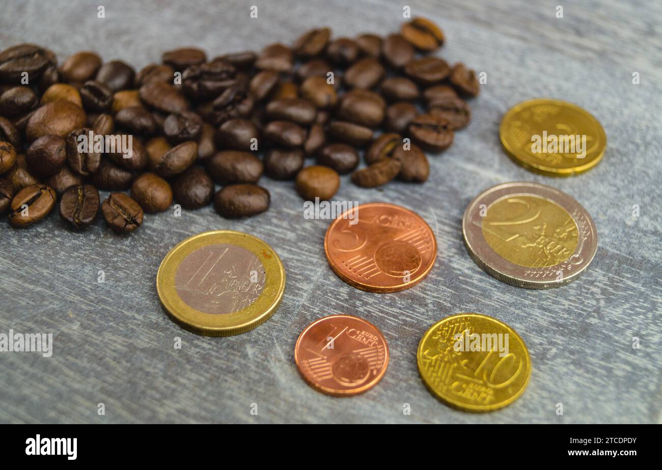 coffee beans with Euro coins, price increase of coffee Stock Photo - Alamy