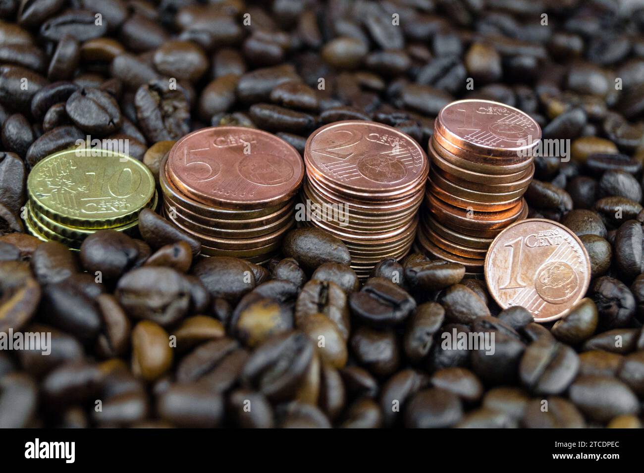 coffee beans with piles of Euro coins, price increase of coffee Stock ...