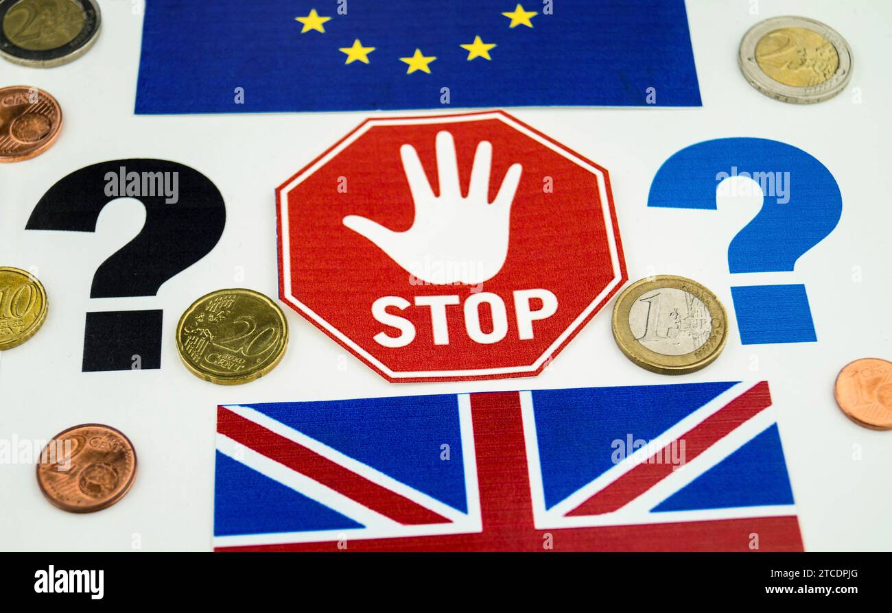 flags of EU and Great Britain with question marks, Euros and stop sign ...